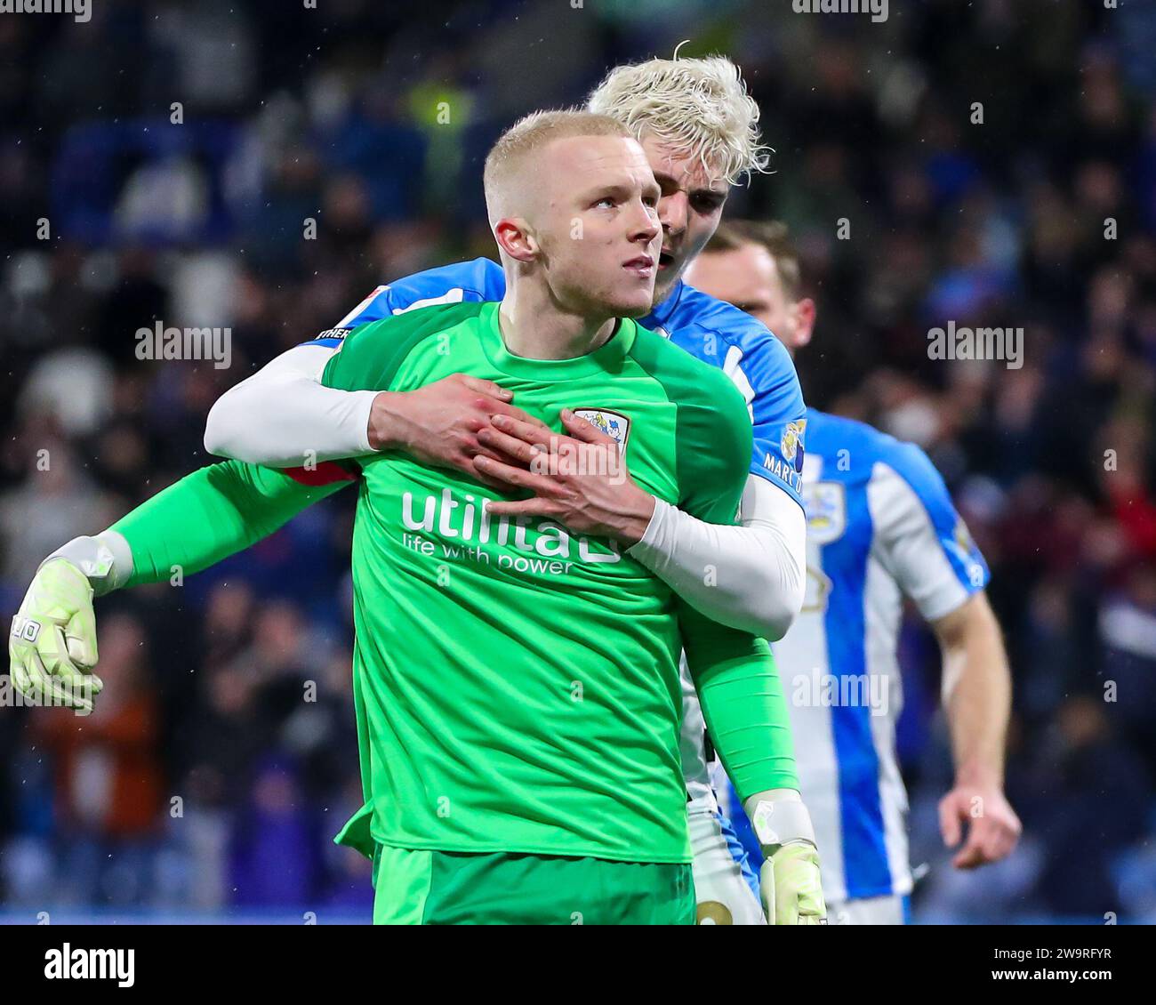 Jacob Chapman #31 of Huddersfield Town celebrates saving a penalty kick ...