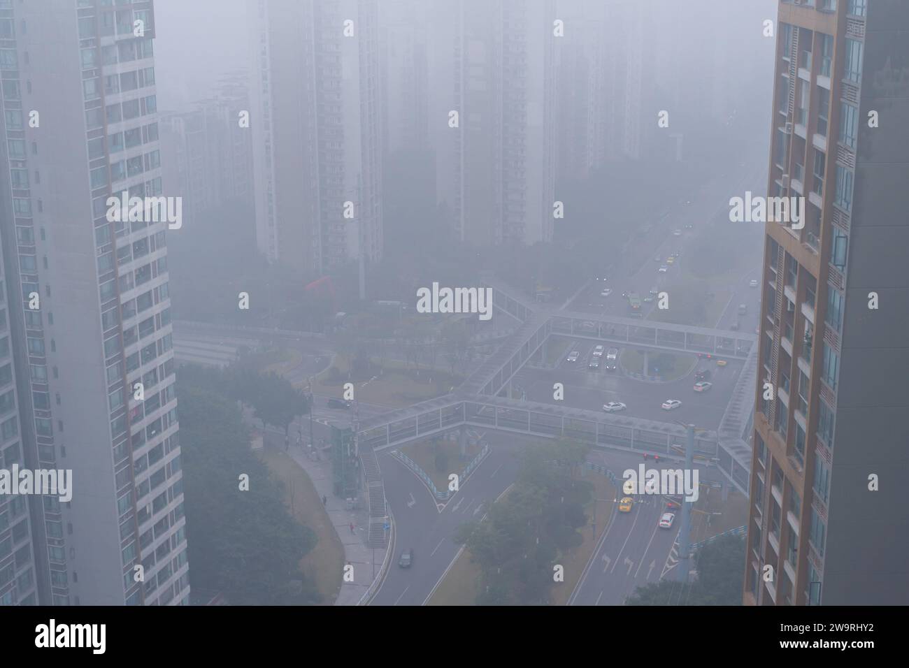 CHONGQING, CHINA - DECEMBER 30, 2023 - The city center is shrouded in ...