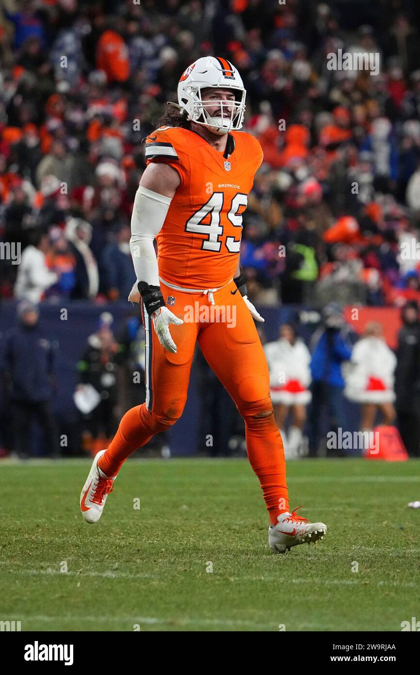 Denver Broncos linebacker Alex Singleton (49) celebrates a play against ...