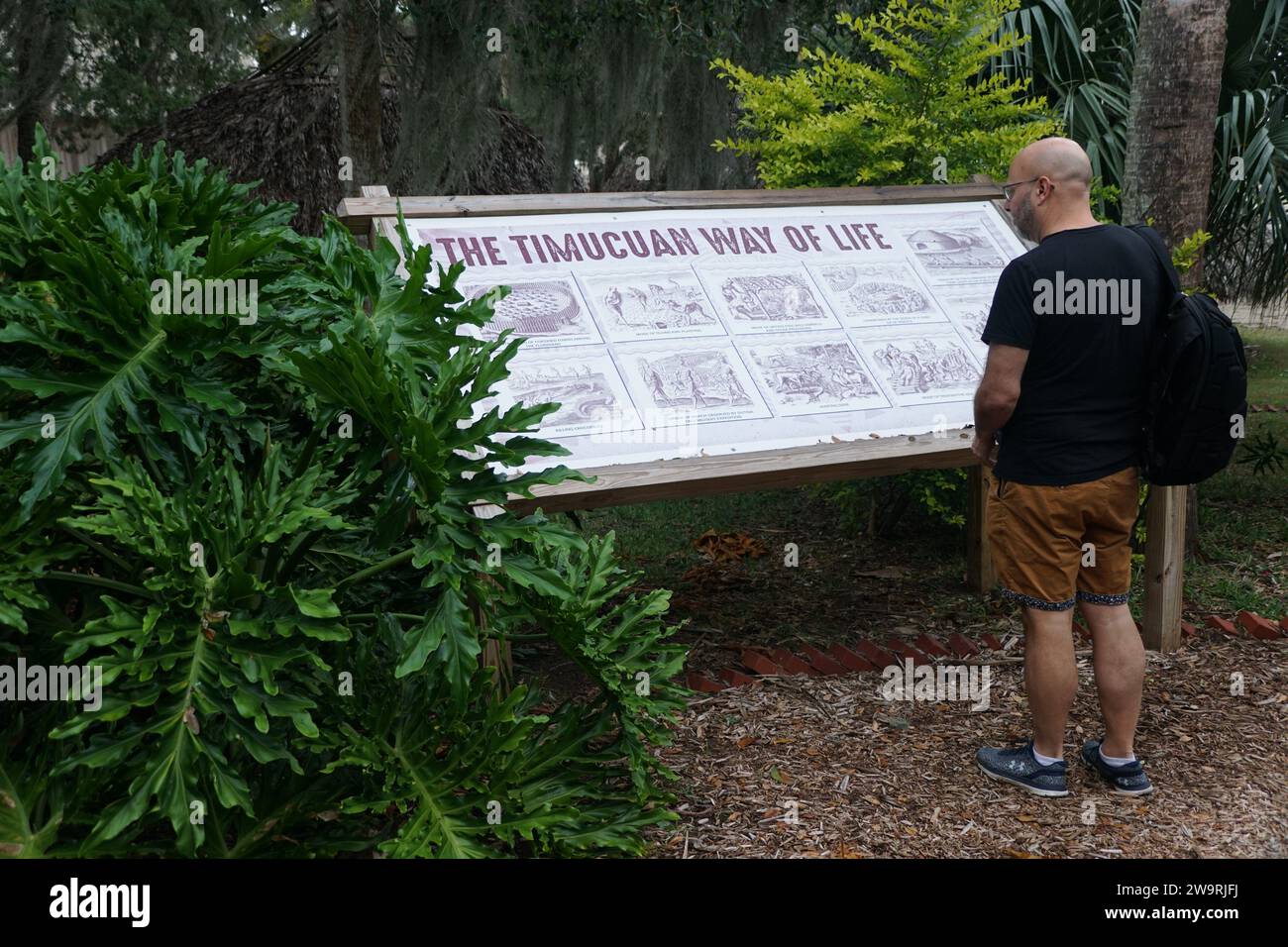 St Augustine, Florida, U.S.A - November 18, 2023 - A visitor reading ...