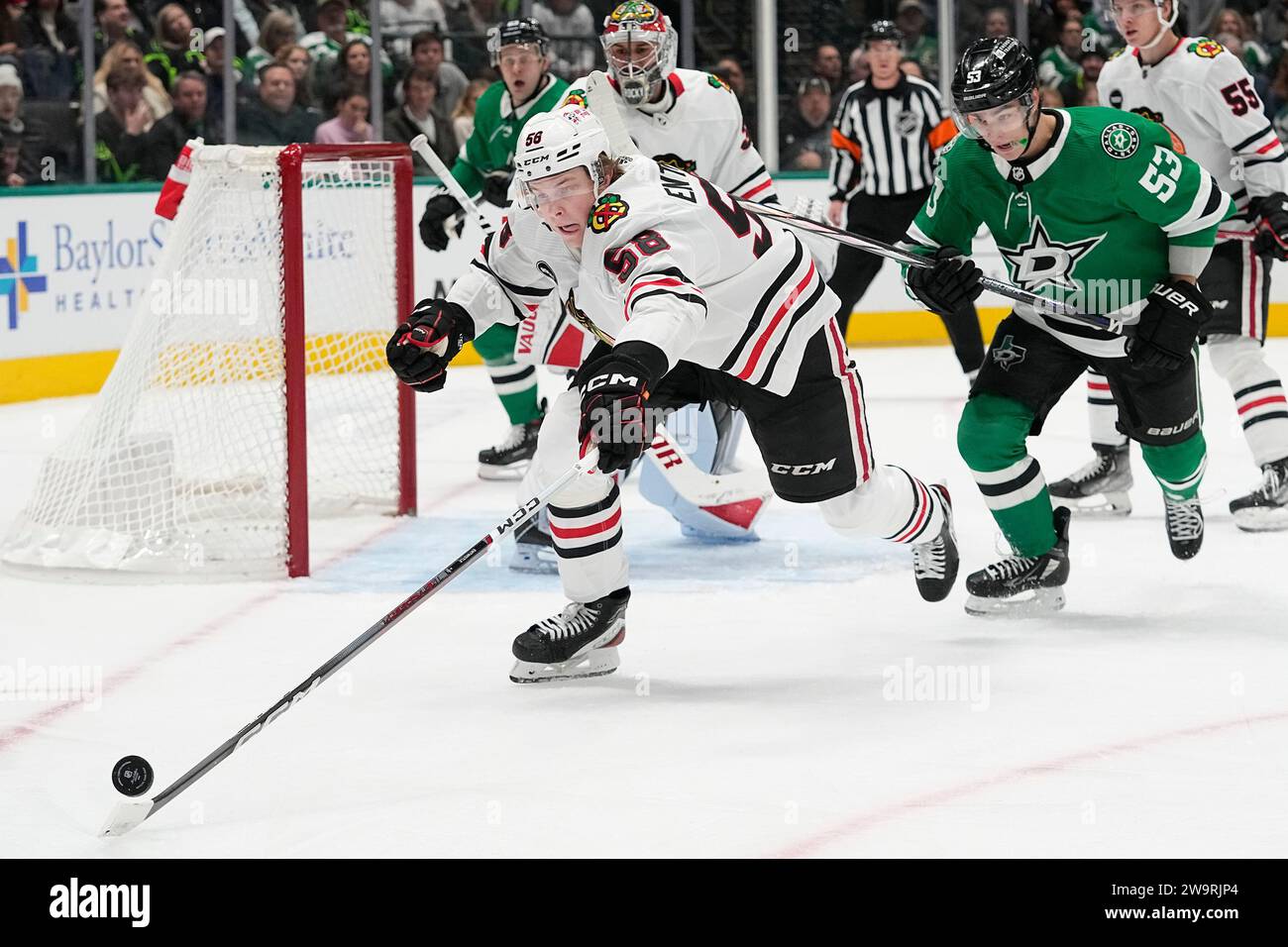 Chicago Blackhawks right wing MacKenzie Entwistle (58) skates for the ...