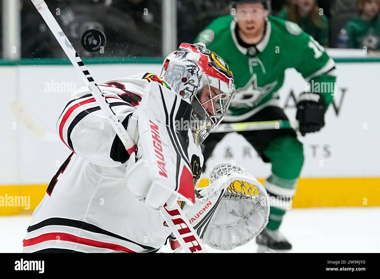 Chicago Blackhawks goaltender Petr Mrazek (34) deflects a shot as ...