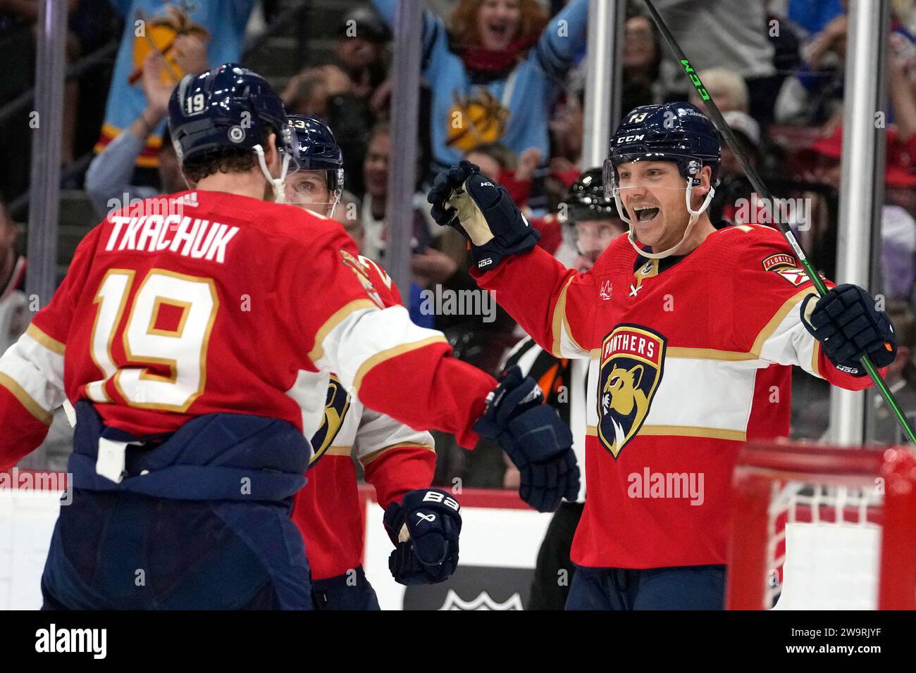 Florida Panthers center Sam Reinhart, right, reacts after scoring ...