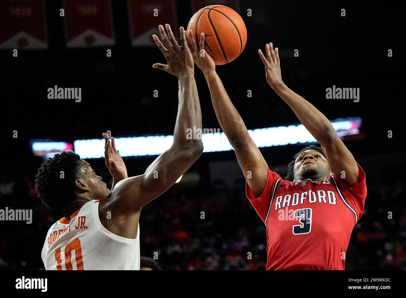 Radford guard Kenyon Giles (3) shoots against Clemson forward RJ ...
