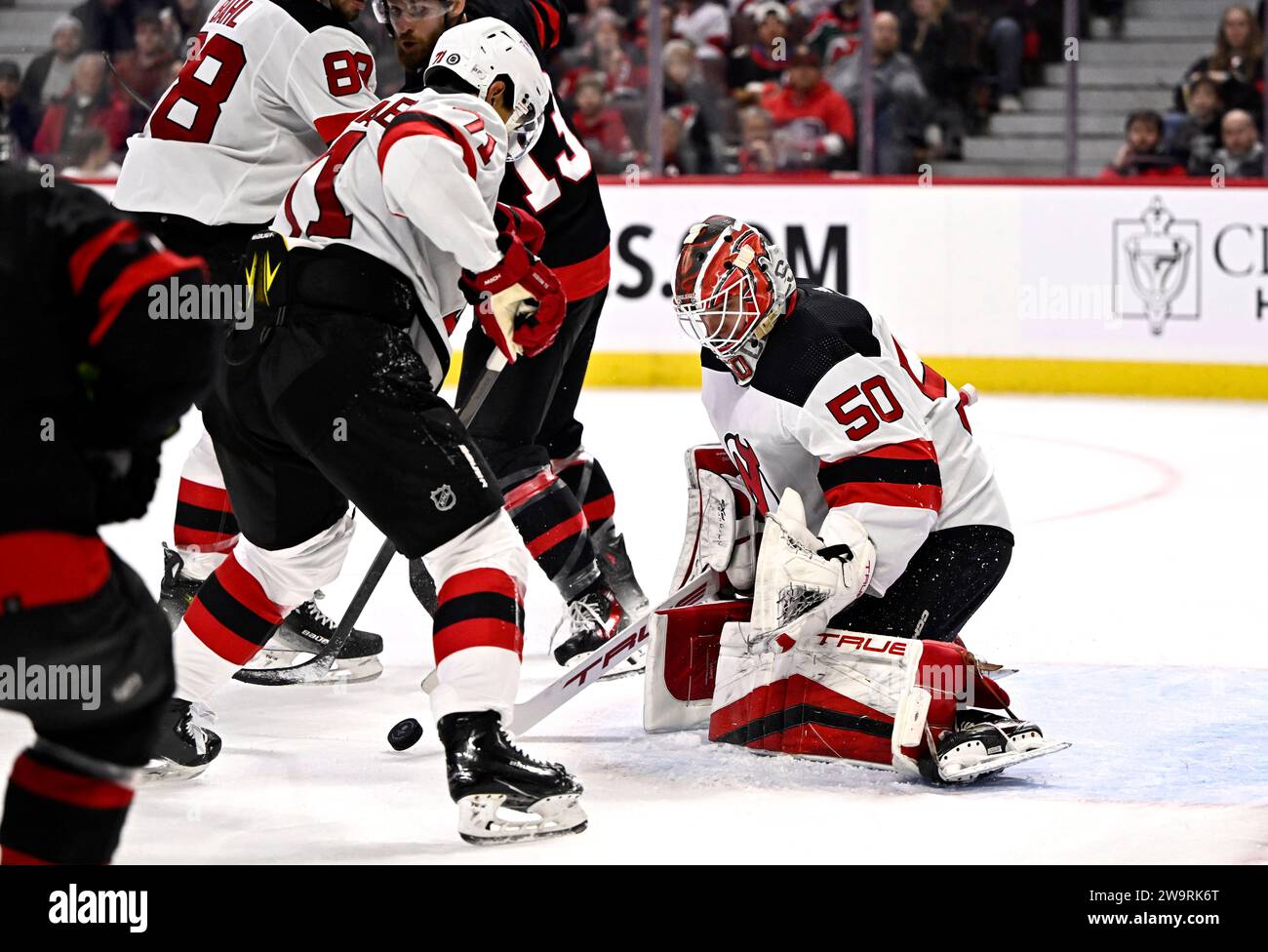 New Jersey Devils goaltender Nico Daws (50) makes a save against the ...