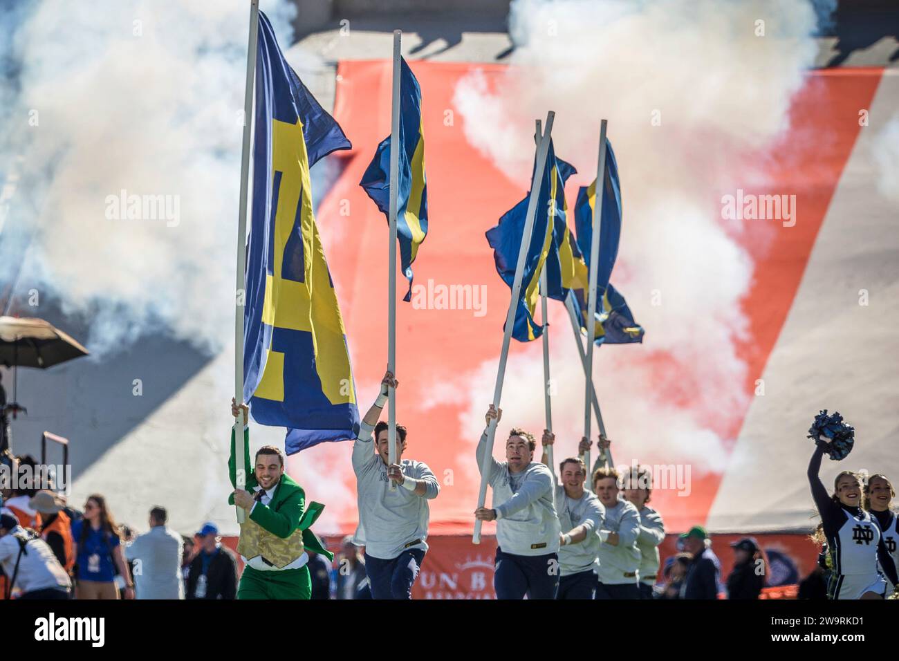 December 29, 2023: Notre Dame Fighting Irish flag runners take the ...