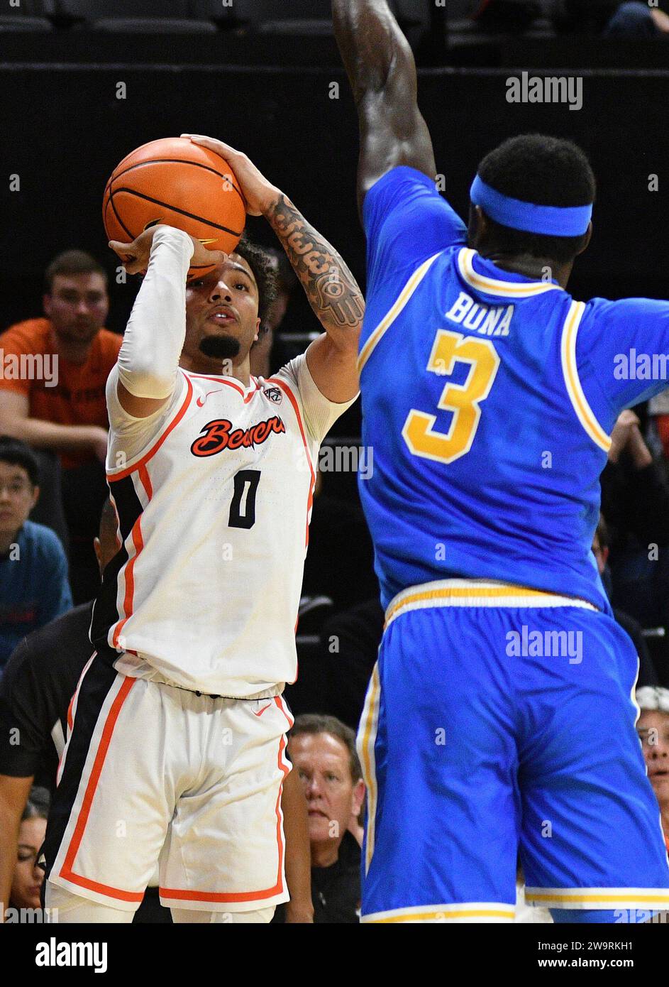 Oregon State guard Jordan Pope (0) shoots in front of UCLA forward Adem ...