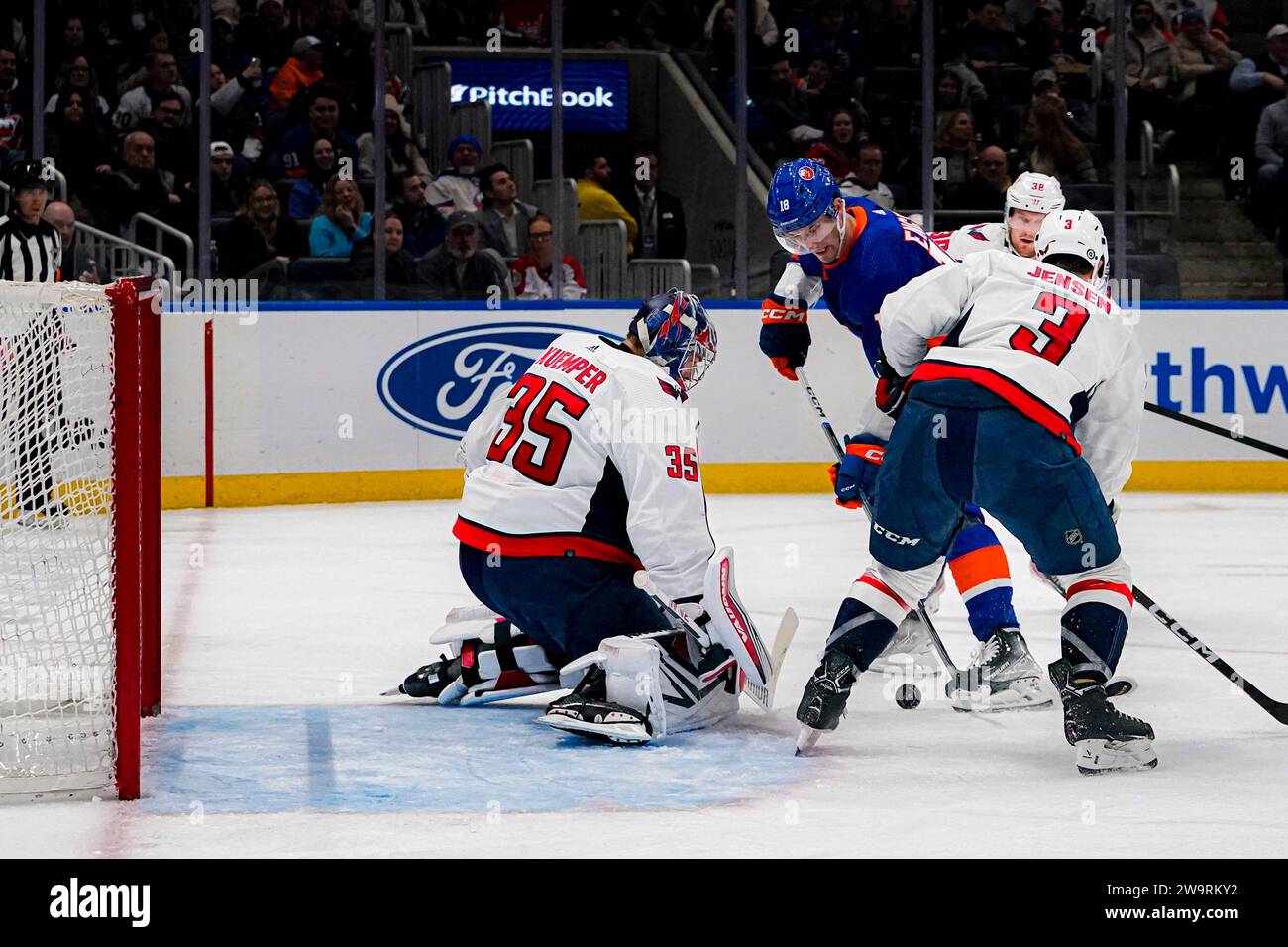 New York Islanders left wing Pierre Engvall looks to shoot at ...