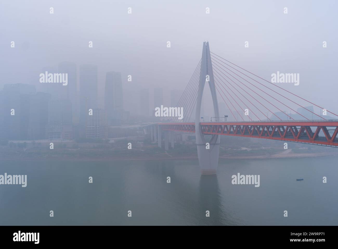 CHONGQING, CHINA - DECEMBER 30, 2023 - The city center is shrouded in ...