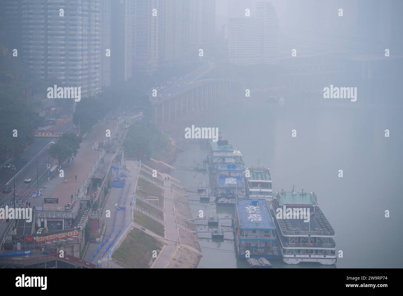 CHONGQING, CHINA - DECEMBER 30, 2023 - The city center is shrouded in ...
