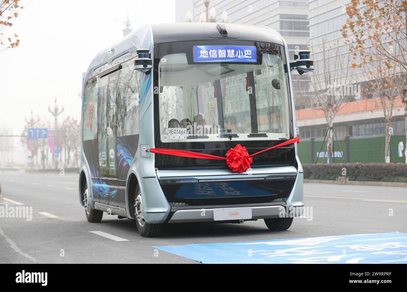 HUZHOU, CHINA - DECEMBER 30, 2023 - A driverless bus is seen in a ...