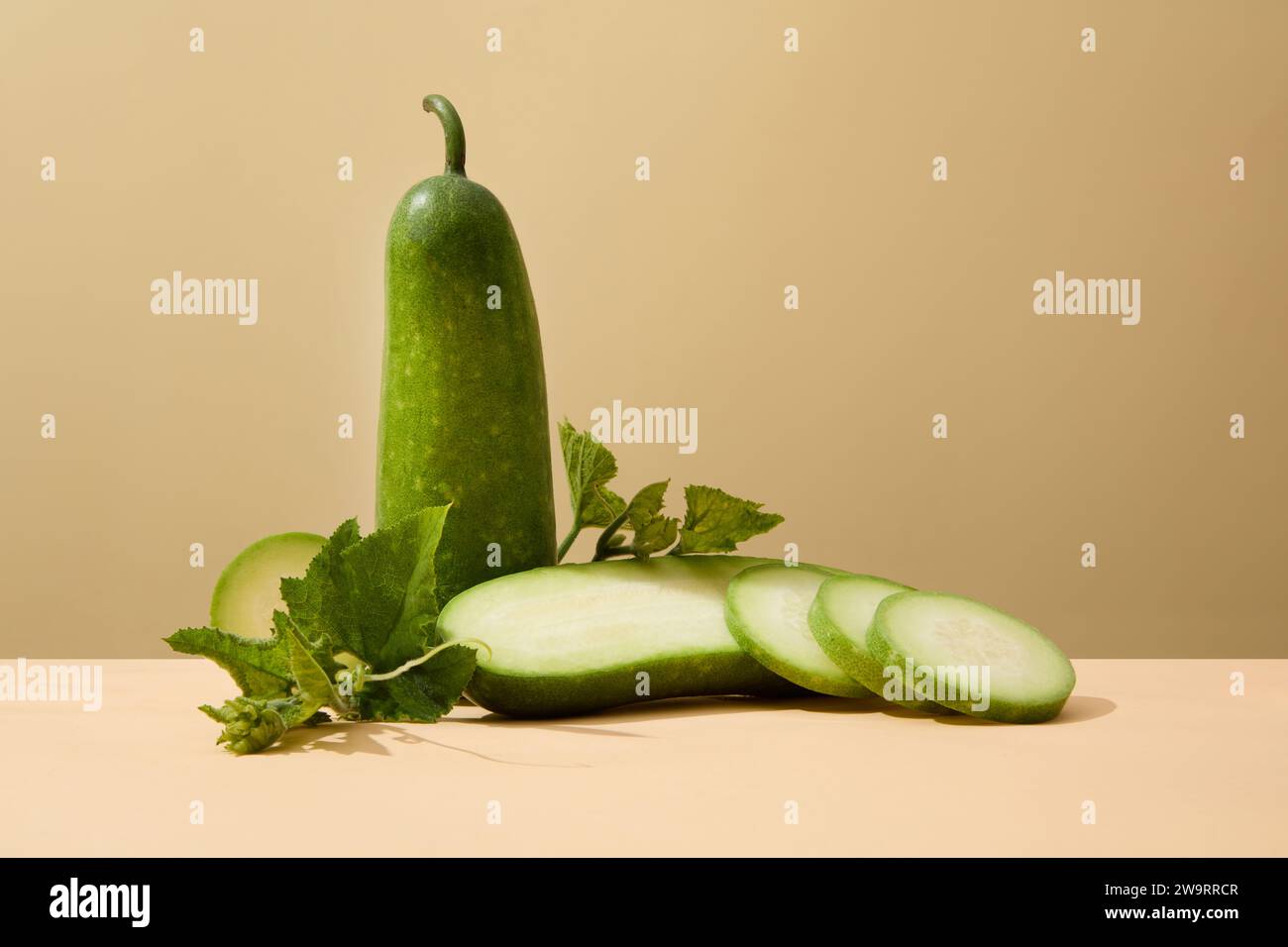 Organic fruit concept with winter melon cut in slices and half. The ...