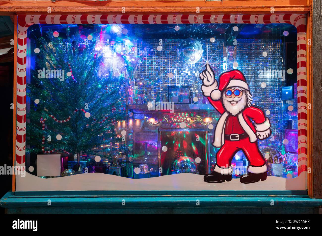 Disco Santa Clause Decorated Window Stock Photo - Alamy