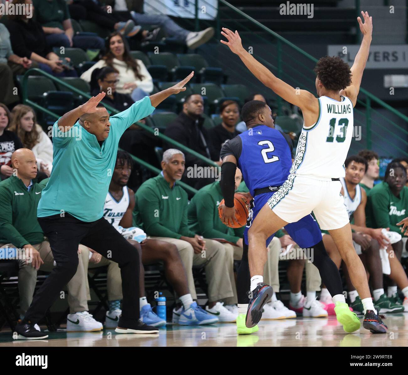 New Orleans, USA. 29th Dec, 2023. Tulane Green Wave head coach Ron Hunter reacts after watching ...