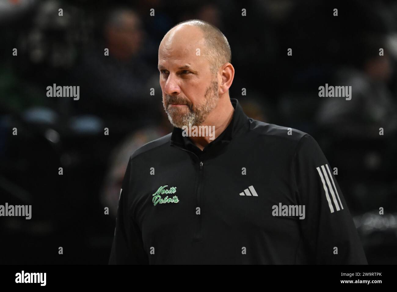 North Dakota Fighting Hawks head coach Paul Sather looks on during a ...