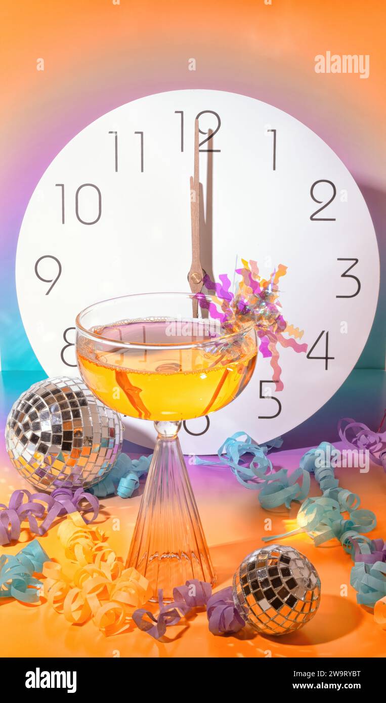 New Years Clock Countdown at 12 Midnight, A Disco Mirror Ball, A Glass ...