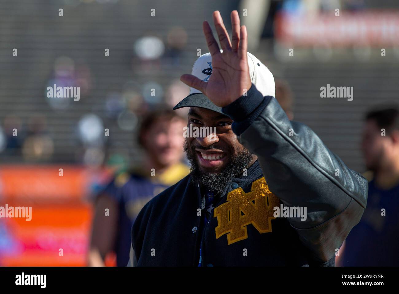 Notre Dame running back Audric Estimé waves to fans during the warmups ...