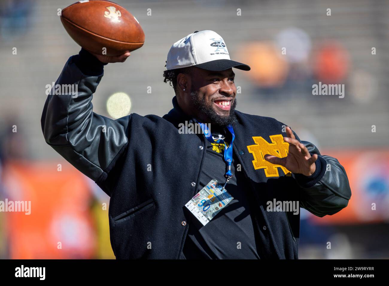 Notre Dame running back Audric Estimé throws a ball during the warmups ...