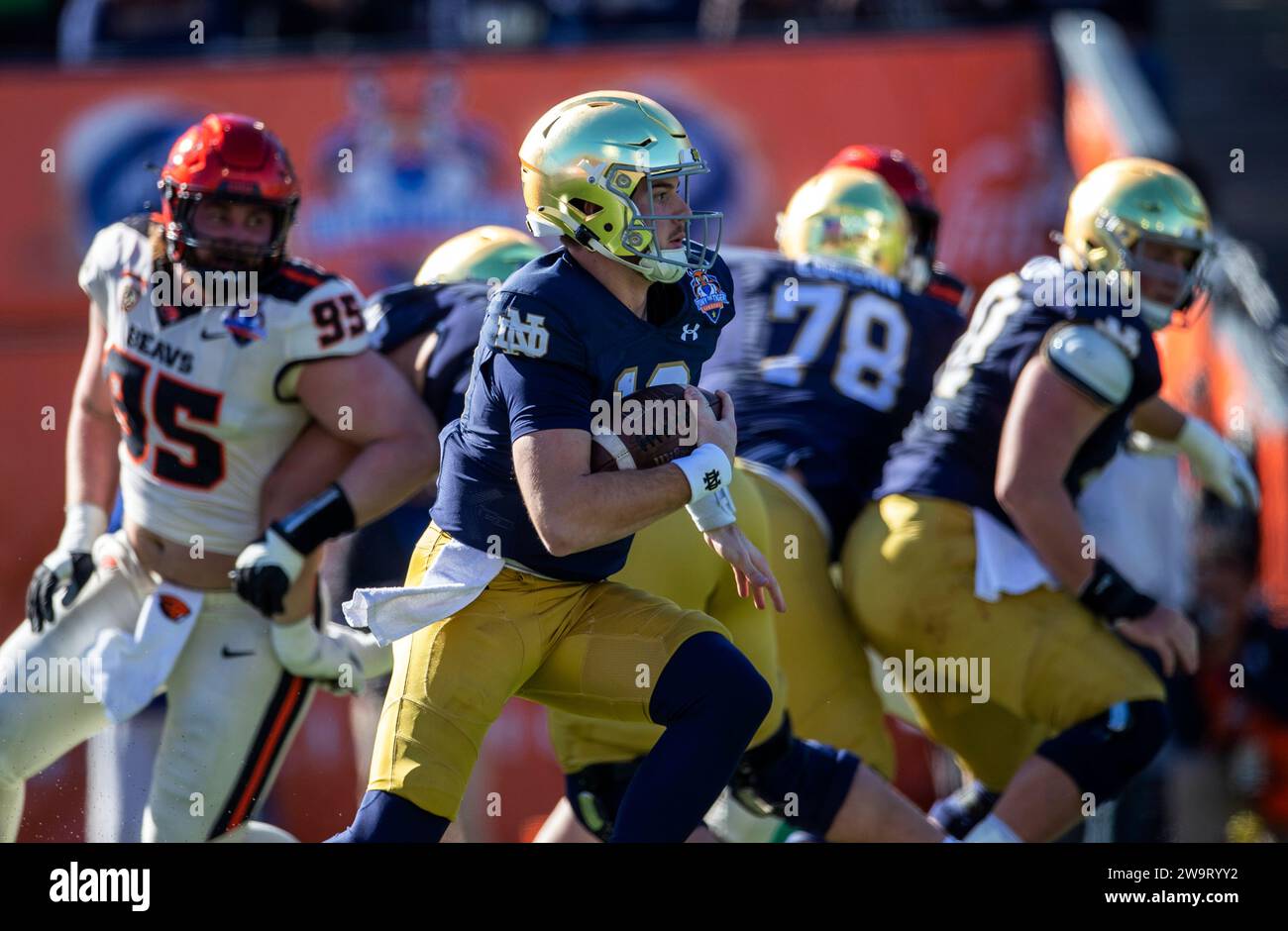Notre Dame quarterback Steve Angeli (18) runs for yardage during the ...