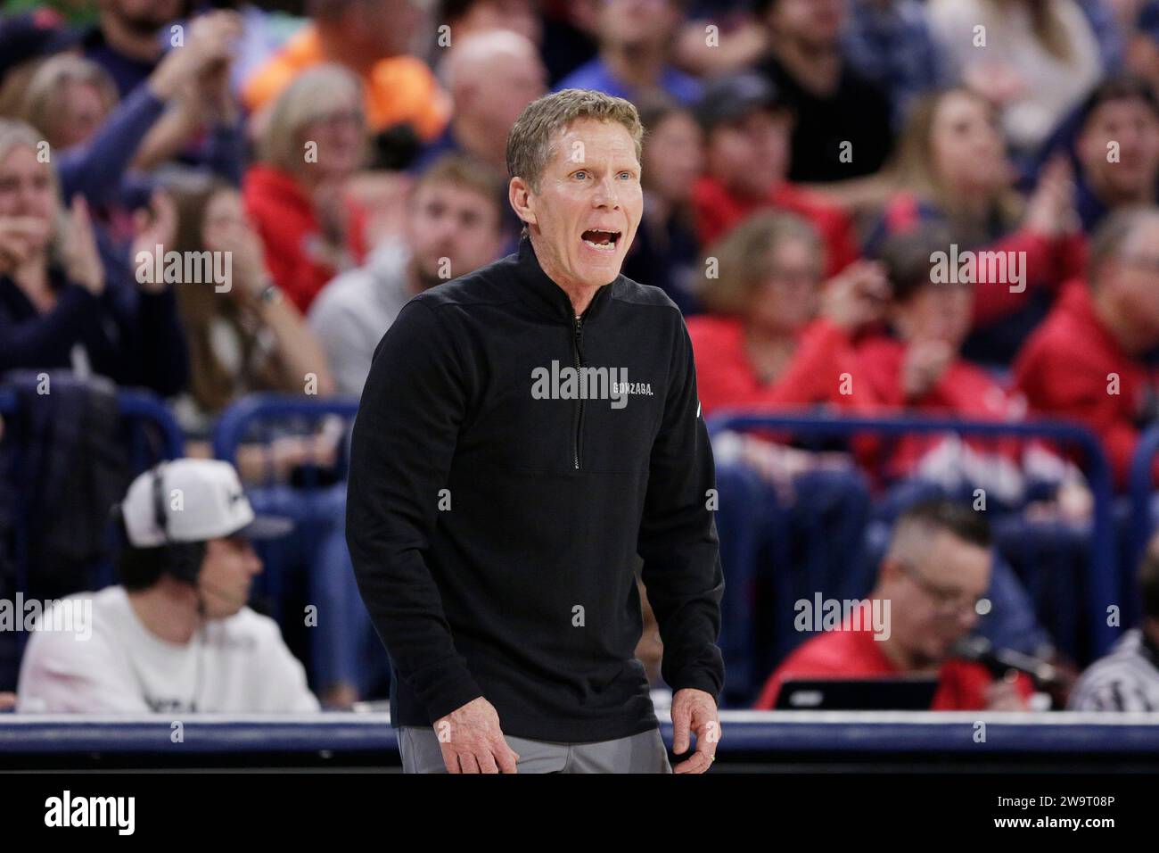 Gonzaga head coach Mark Few directs his team during the first half of an NCAA college basketball ...