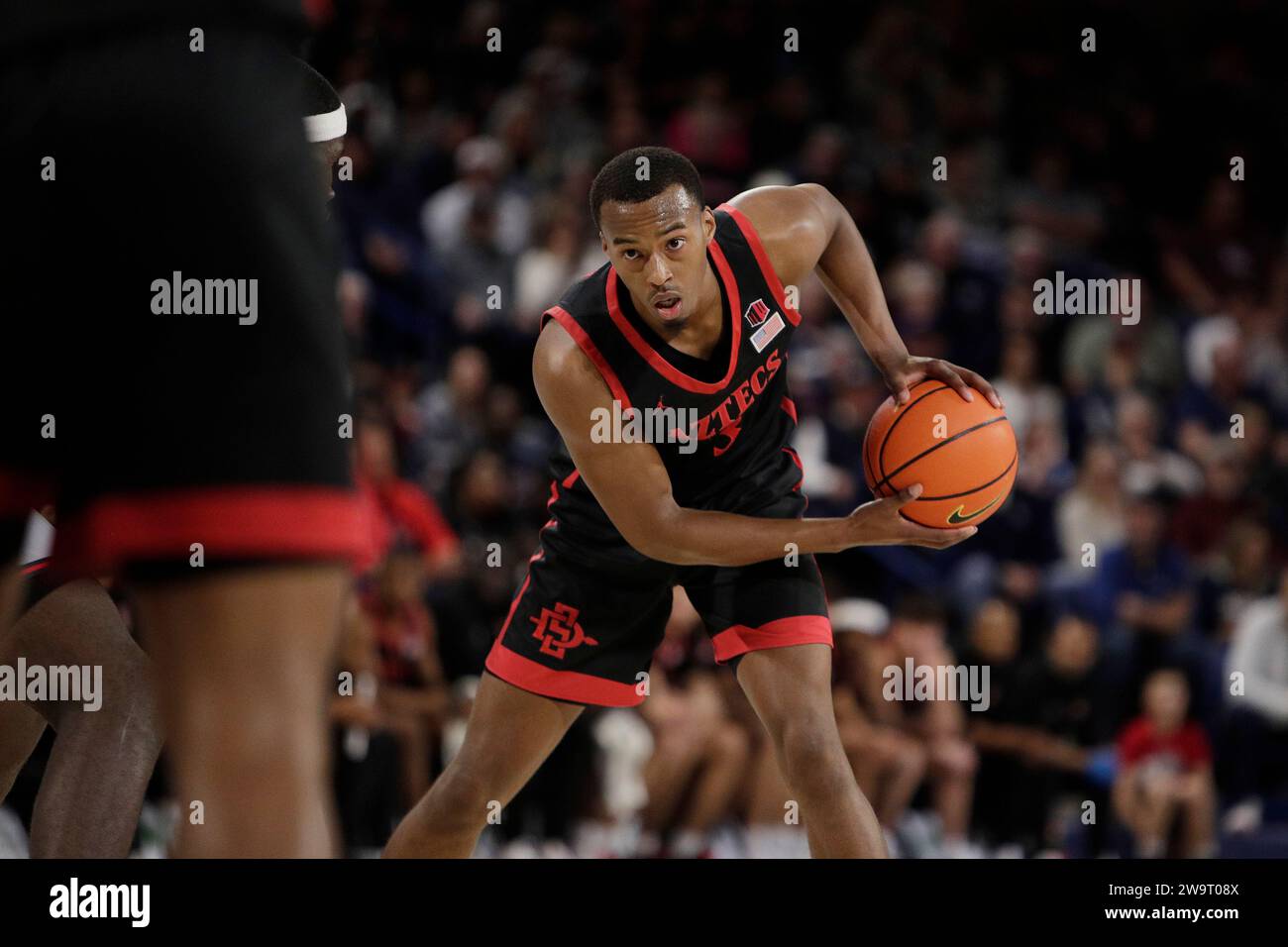 San Diego State guard Micah Parrish controls the ball during the first ...