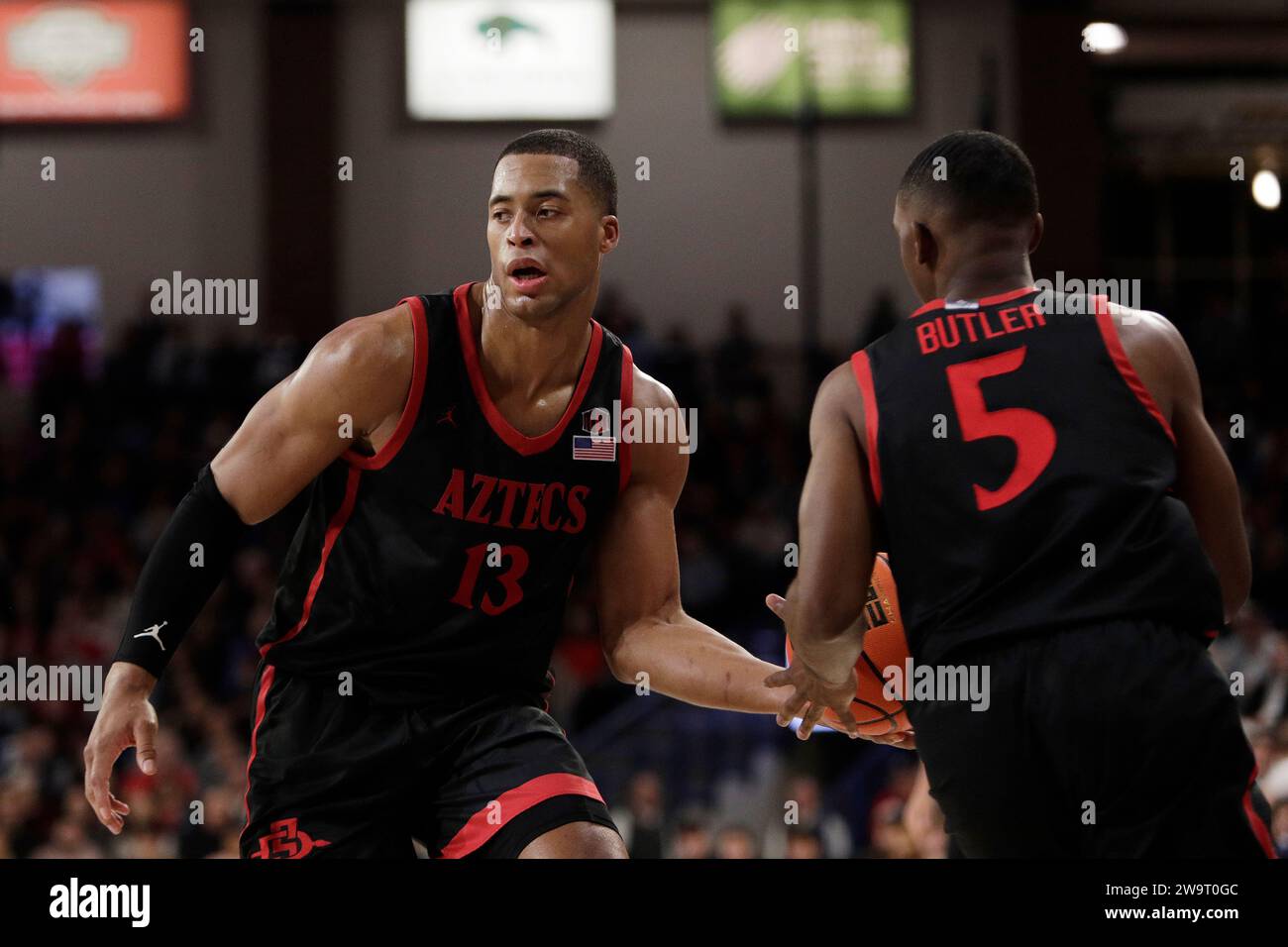 San Diego State forward Jaedon LeDee (13) hands the ball to guard ...
