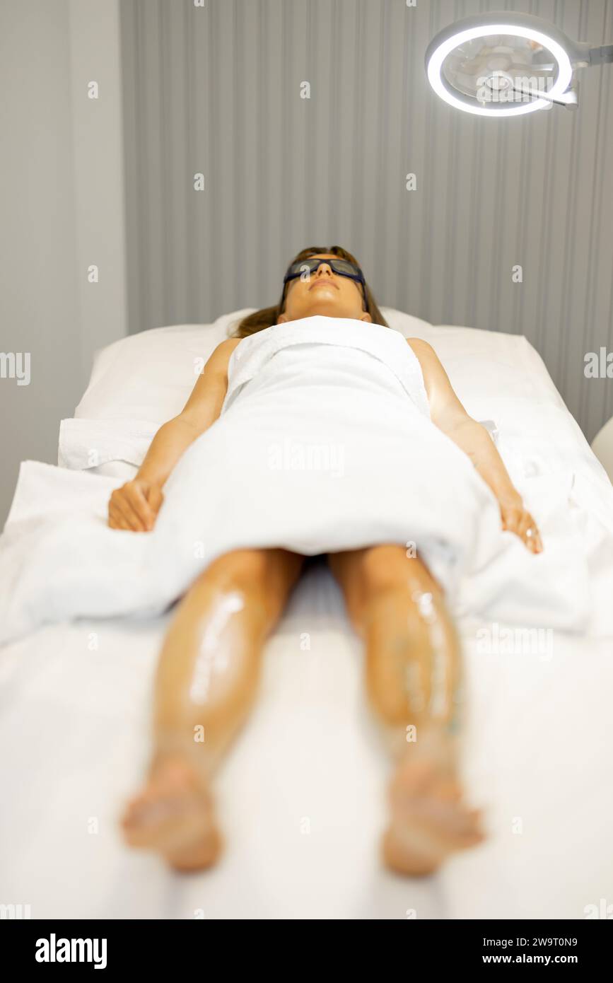 Woman during body procedures hi-res stock photography and images - Alamy