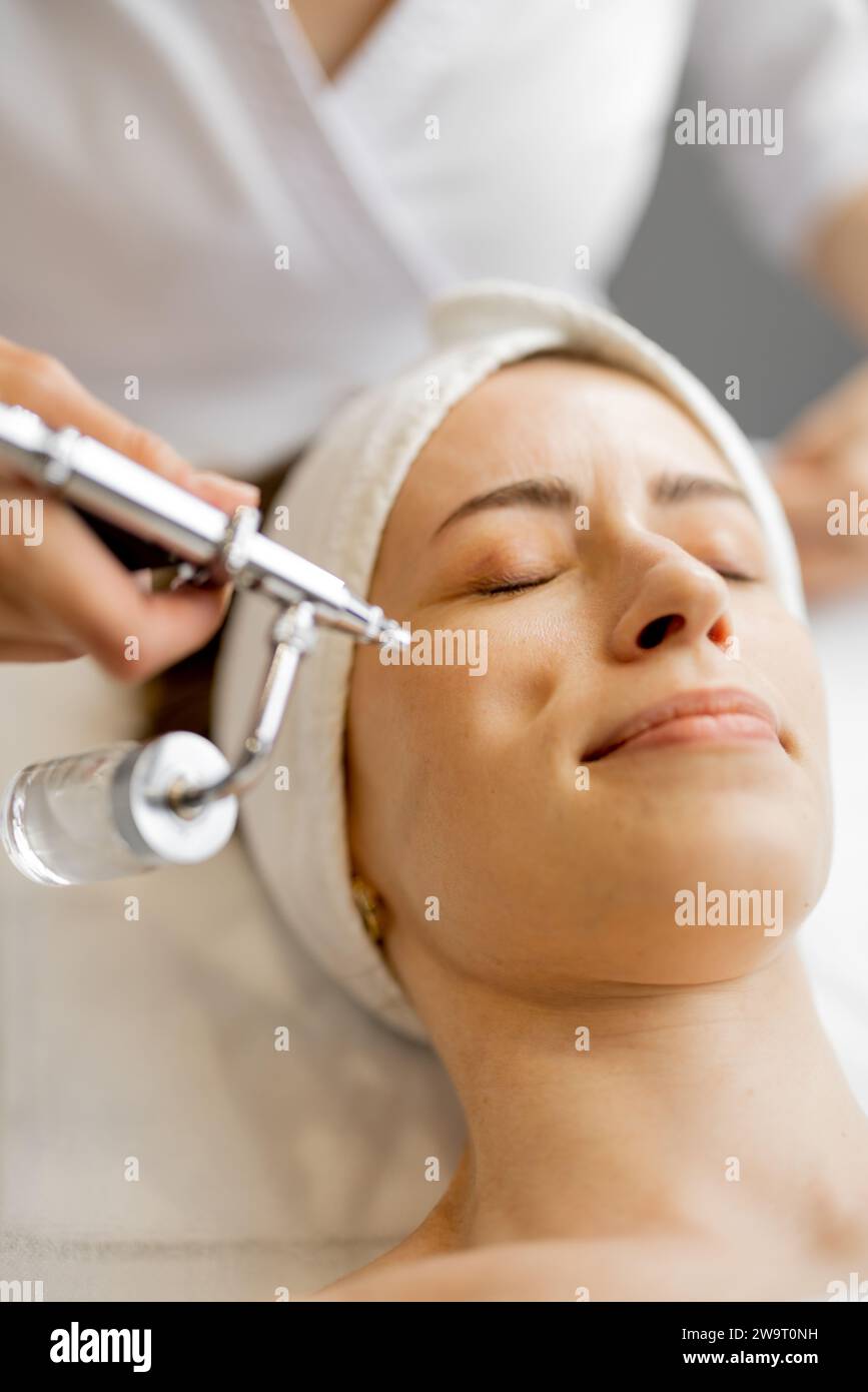 Woman receiving oxygen mesotherapy hi-res stock photography and images - Alamy