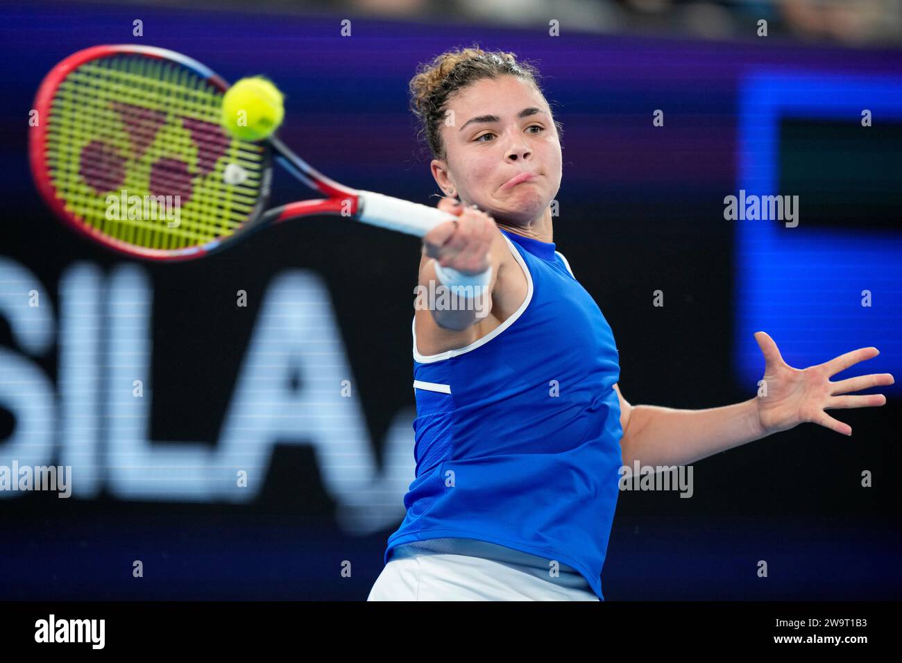Italy's Jasmine Paolini plays a forehand to Germany's Angelique Kerber ...