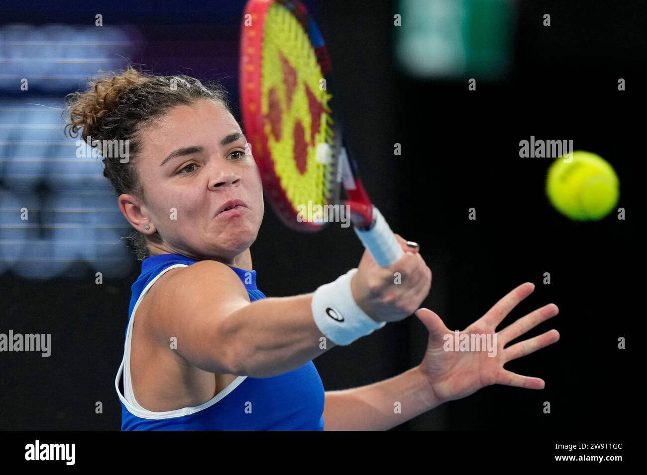Italy's Jasmine Paolini plays a forehand to Germany's Angelique Kerber ...
