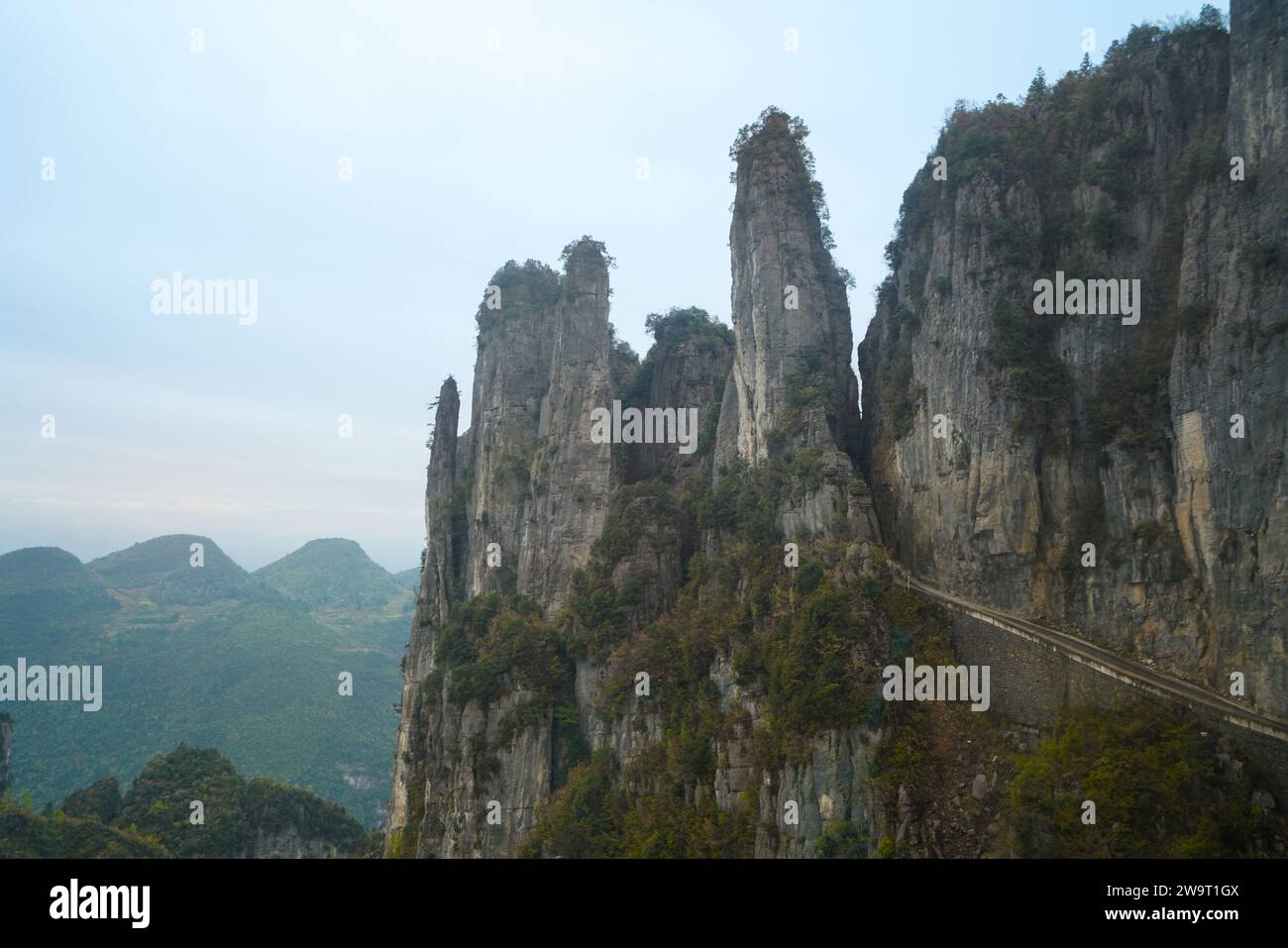 A mountain of huge pillars formed from Triassic limestone. Enshi Grand ...