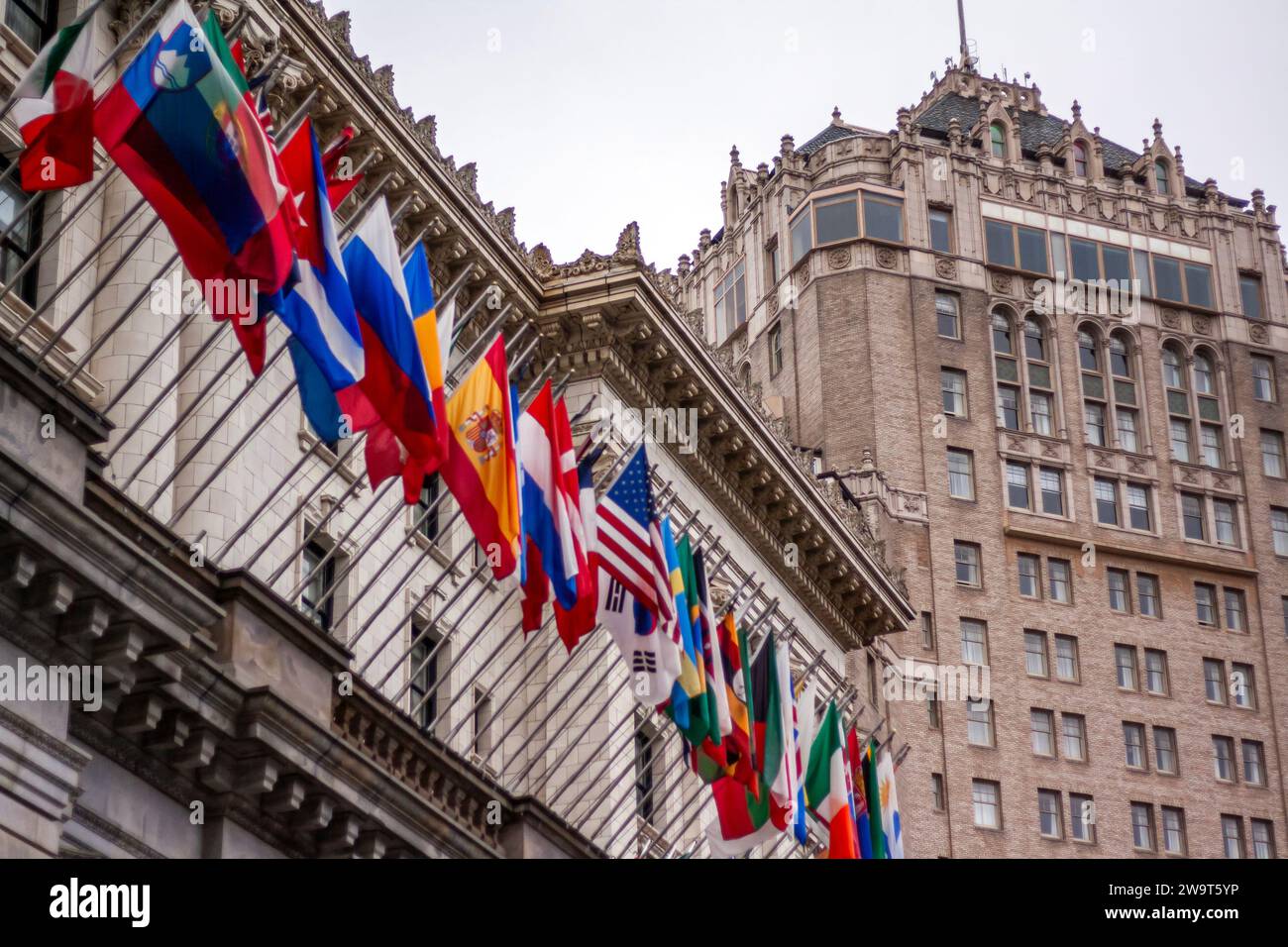 World flags of many nations flying outside the luxury Fairmont Hotel ...