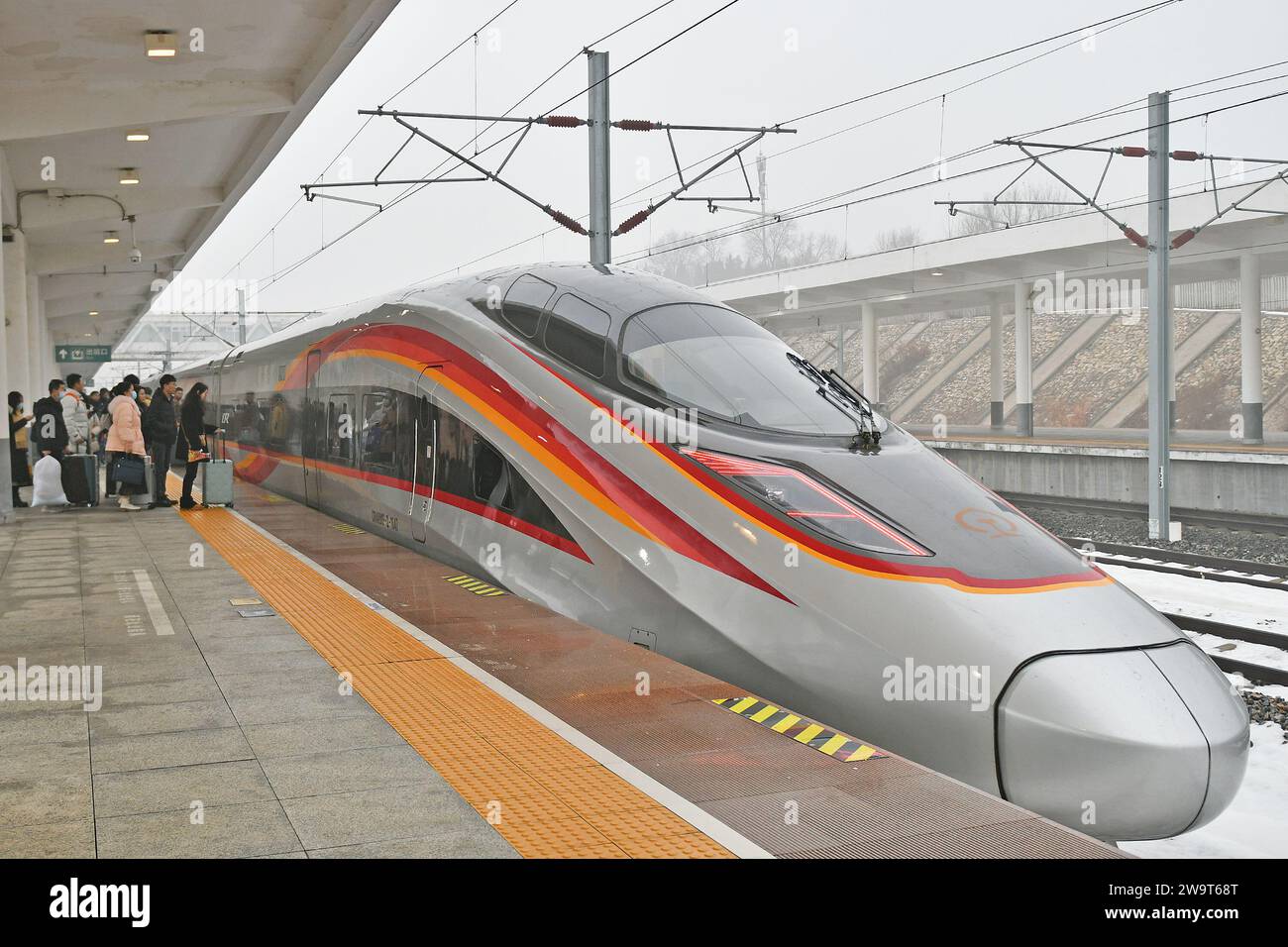 YANTAI, CHINA - DECEMBER 30, 2023 - Passengers travel at Yantai South ...