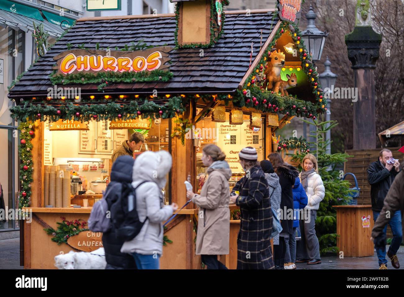 Bonn, Germany - December 17, 2023 : View of a small food stand selling ...