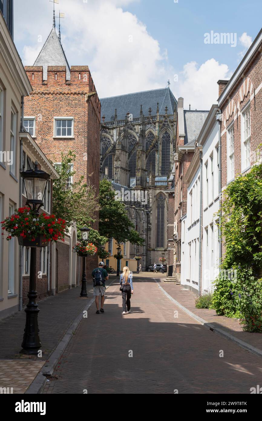 Historic medieval street with the Gothic cathedral - Domkerk, in the ...