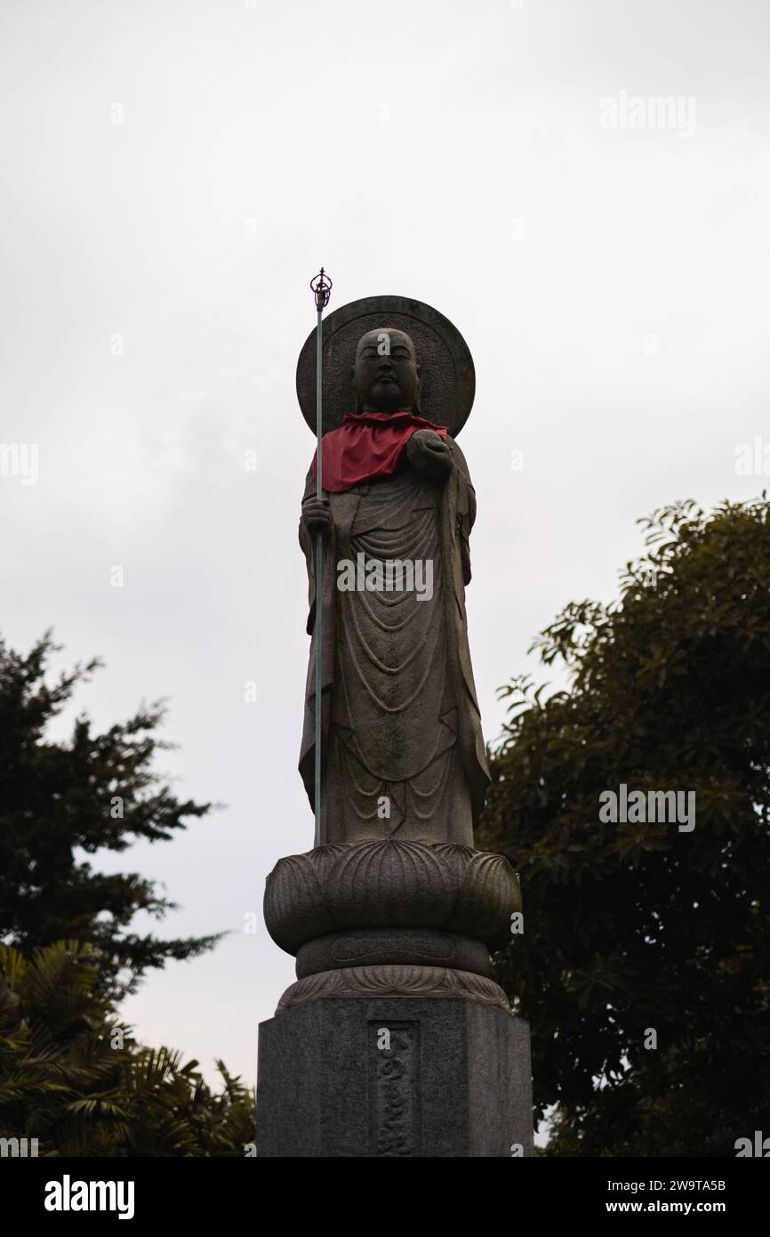 Singapore - July 9 2023: Stone Monk Statue With Red Scarf Stock Photo ...
