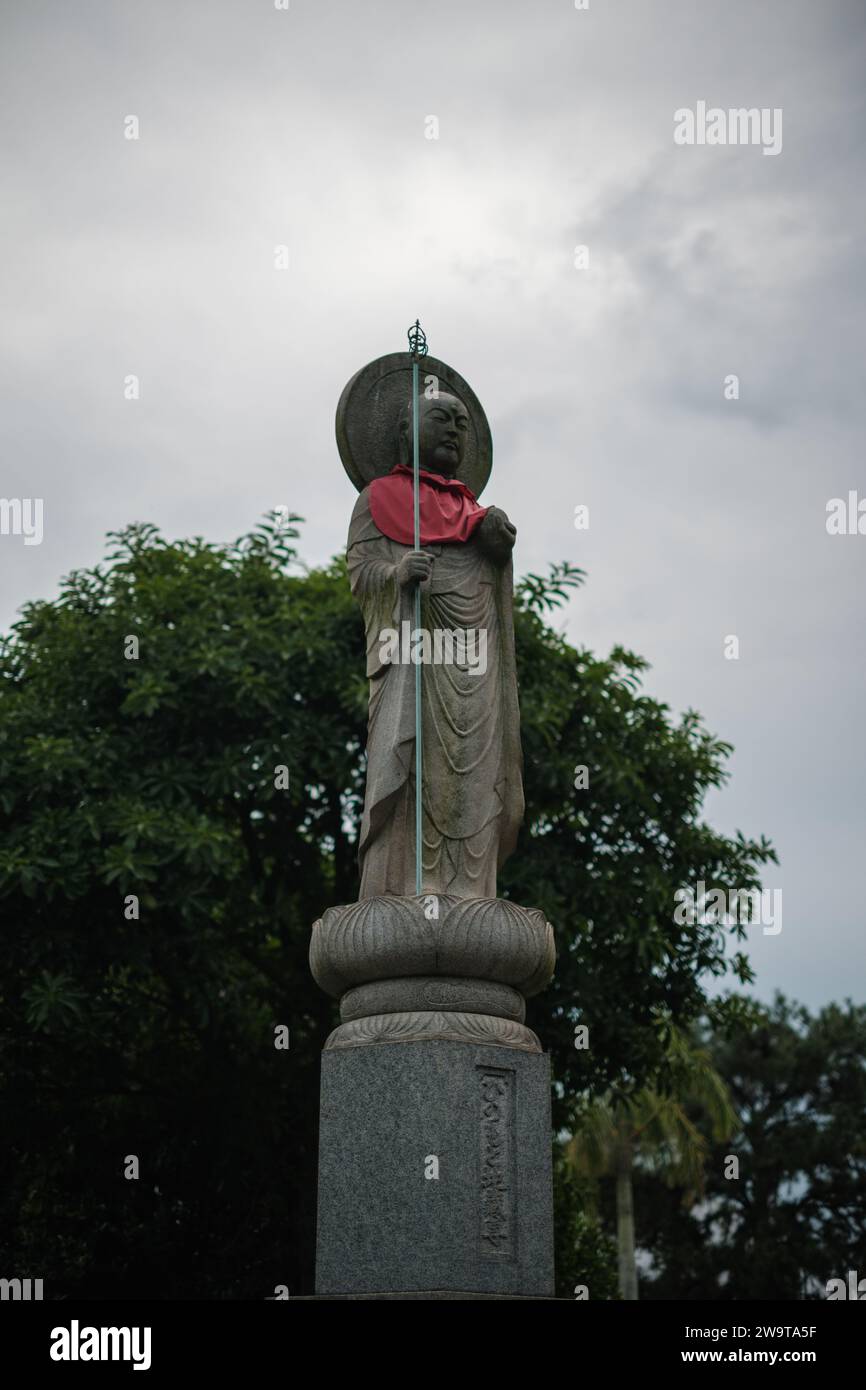 Singapore - July 9 2023: Stone Monk Statue With Red Scarf Stock Photo ...