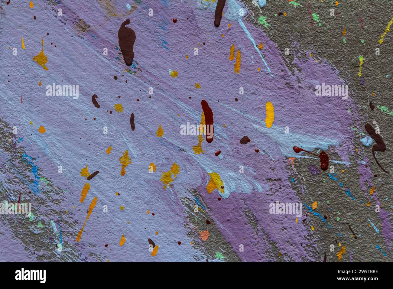 White plastered wall splattered with red paint. Paint splashes on the ...