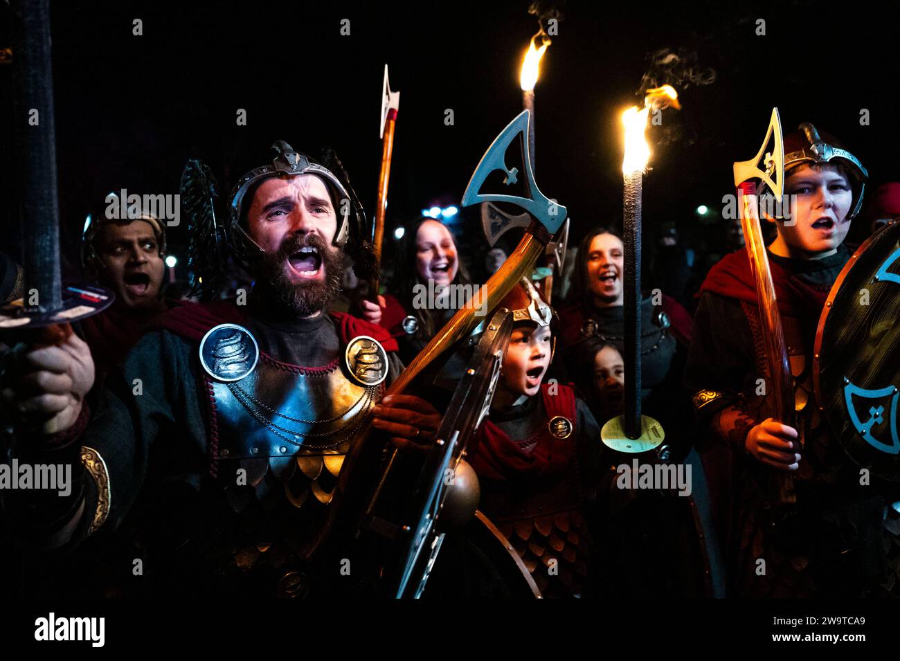 Vikings from Shetland’s South Mainland Up Helly Aa’ Jarl Squad lead the first torchlit ...