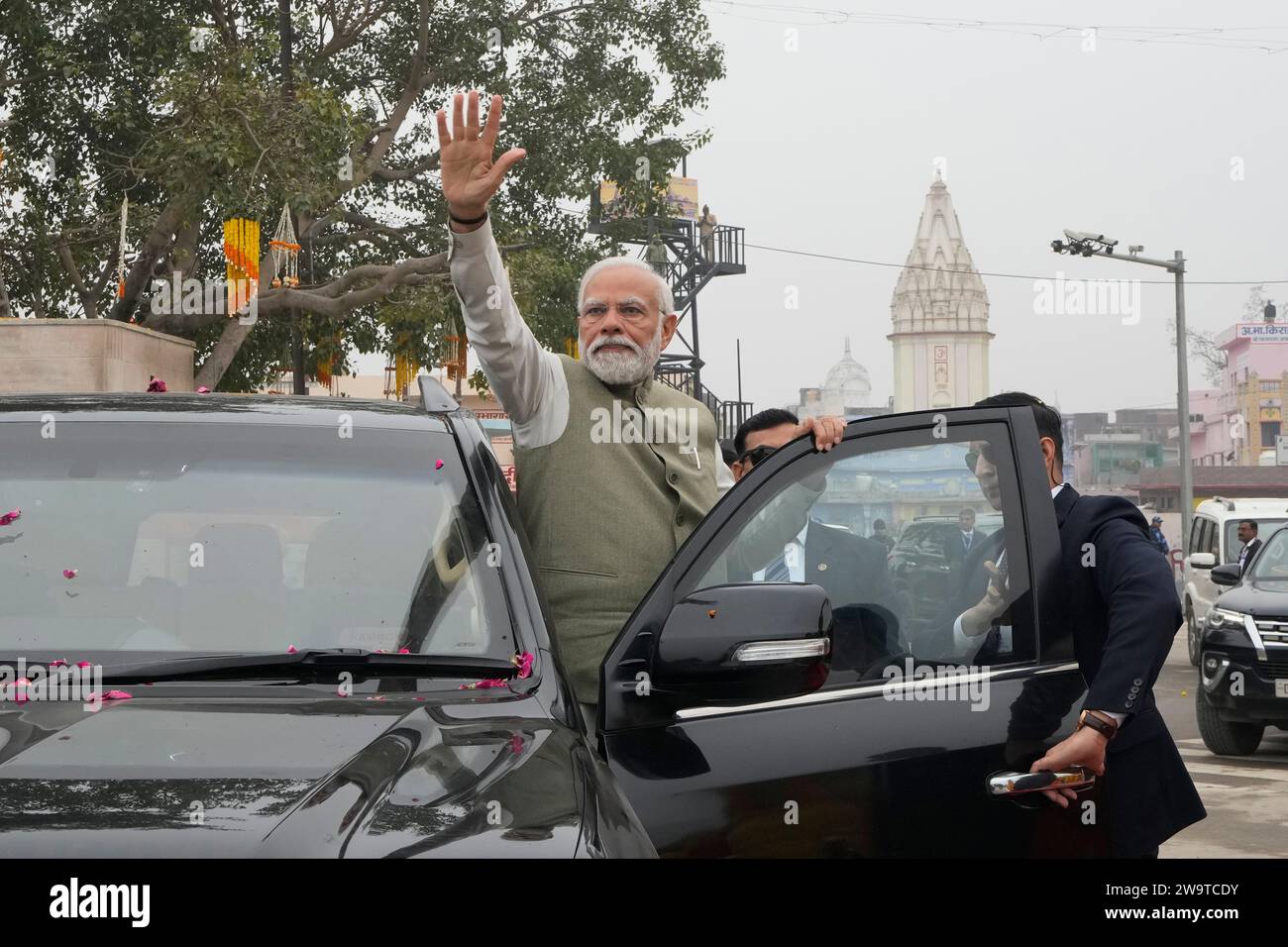 Indian Prime Minister Narendra Modi waves to the crowd during a road ...