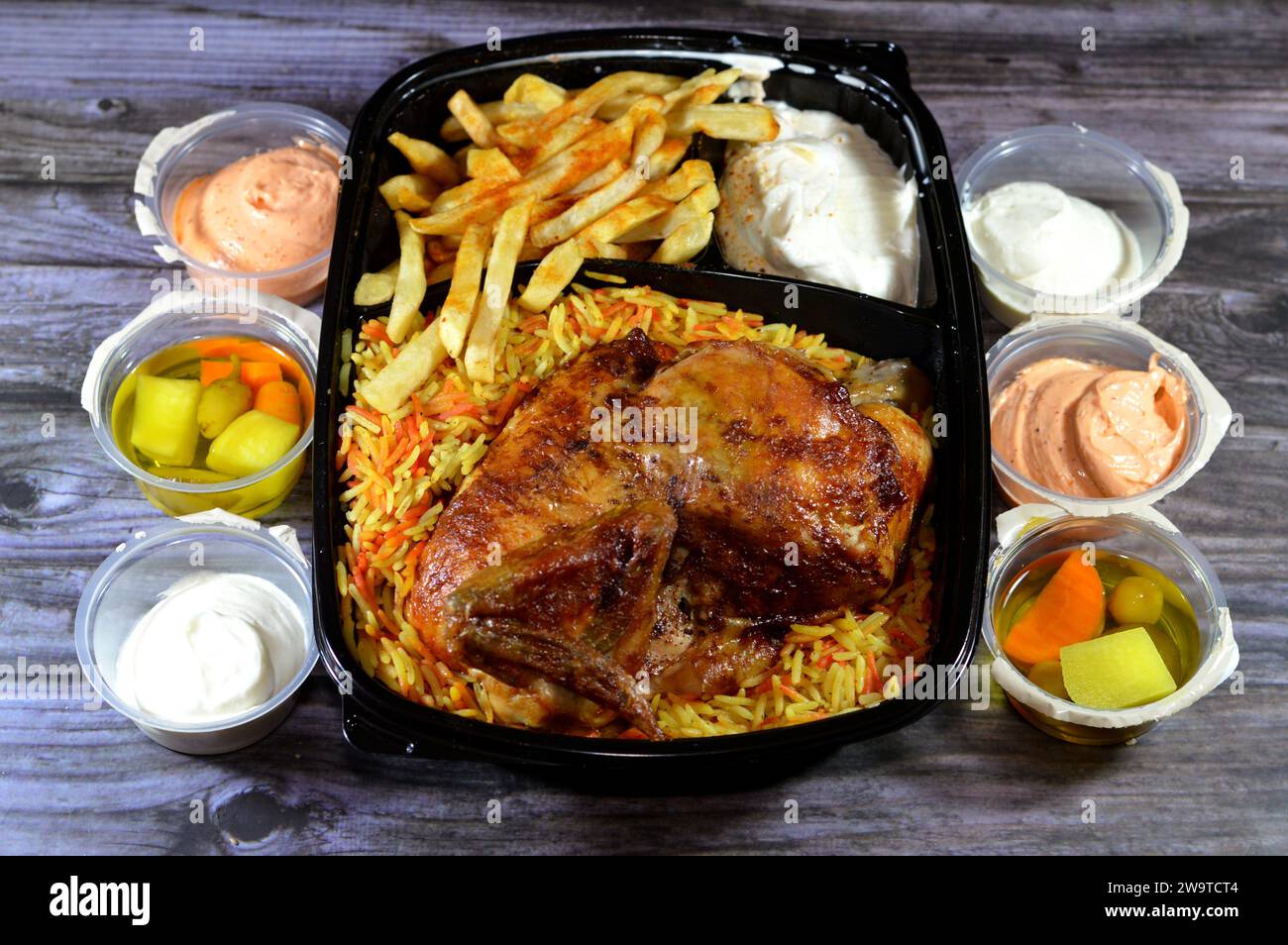 Arabic Syrian cuisine of machine grilled barbecued chicken with ...