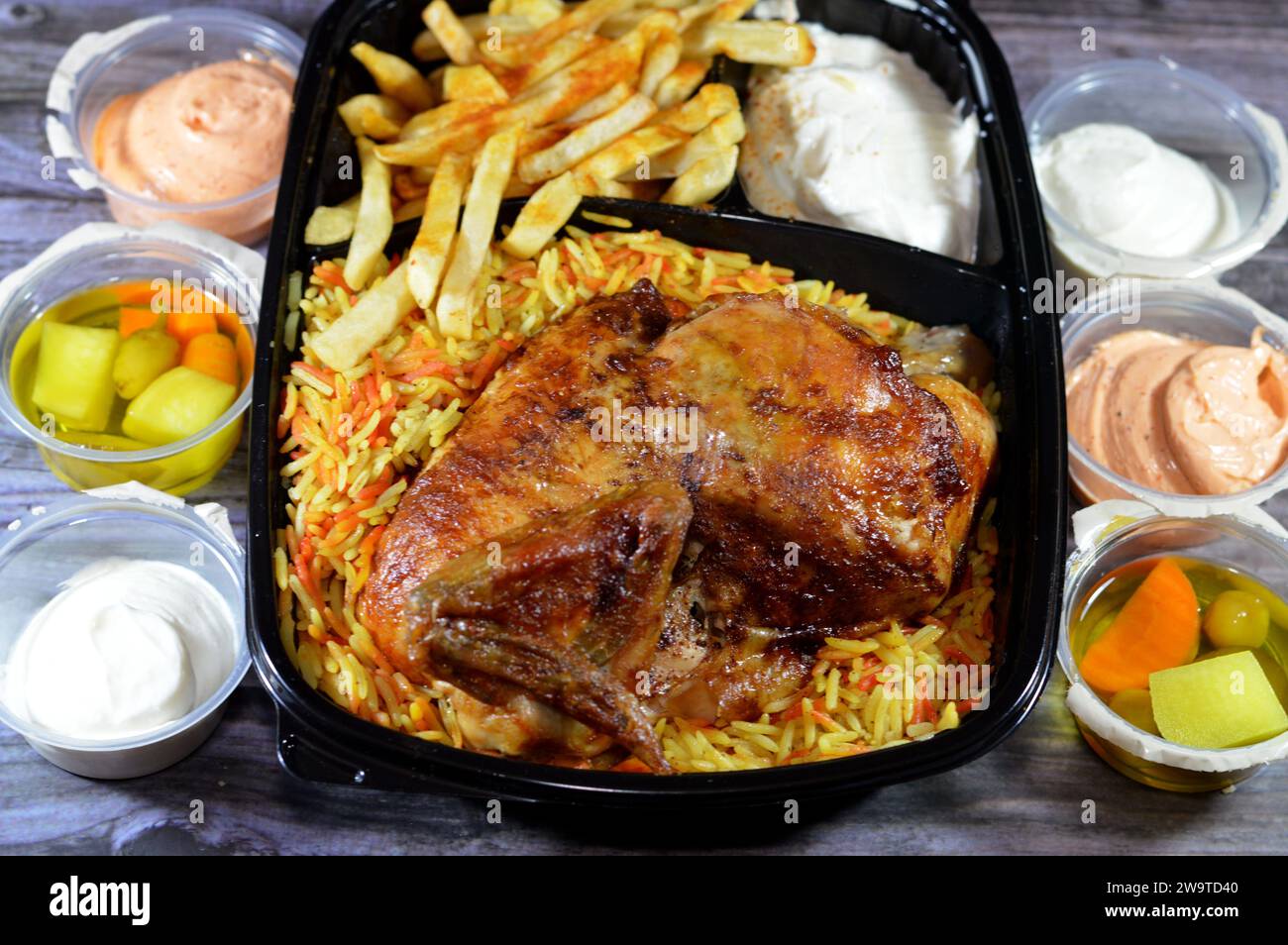 Arabic Syrian cuisine of machine grilled barbecued chicken with ...