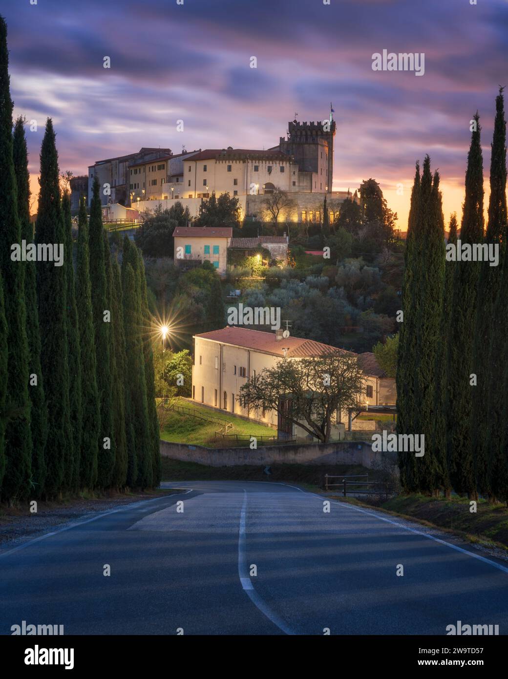 Rosignano Marittimo castle and village view from a cypress road at ...