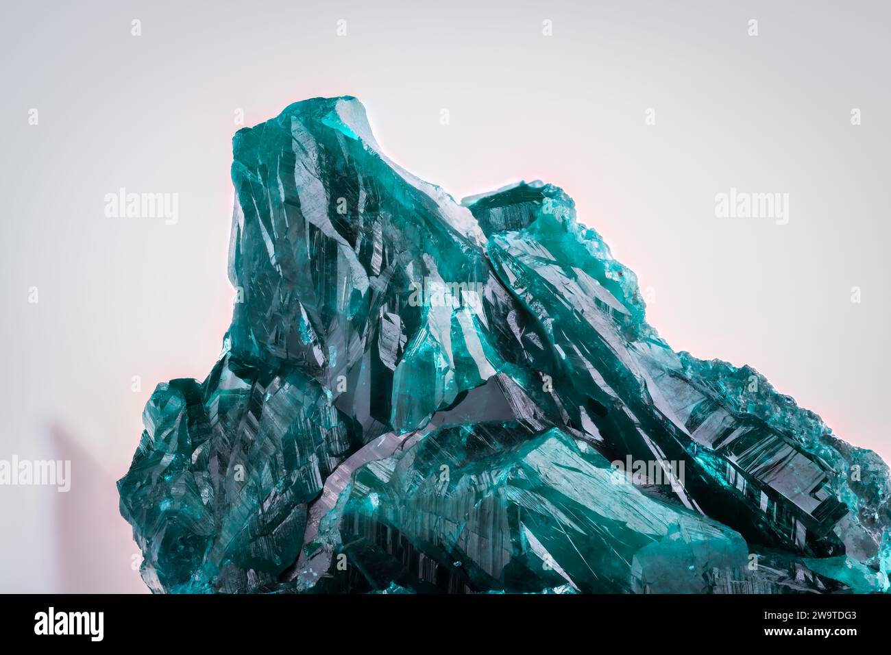 Dioptase crystal on white background. macro detail texture background ...