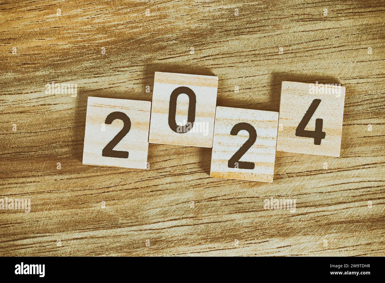 The year 2024 on wooden letters Stock Photo - Alamy