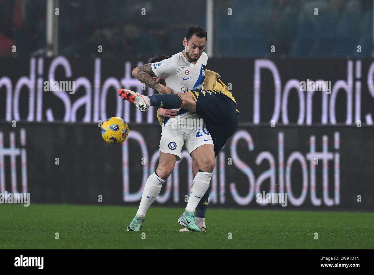 Hakan Calhanoglu (Inter)Aaron Martin (Genoa) during the Italian "Serie ...