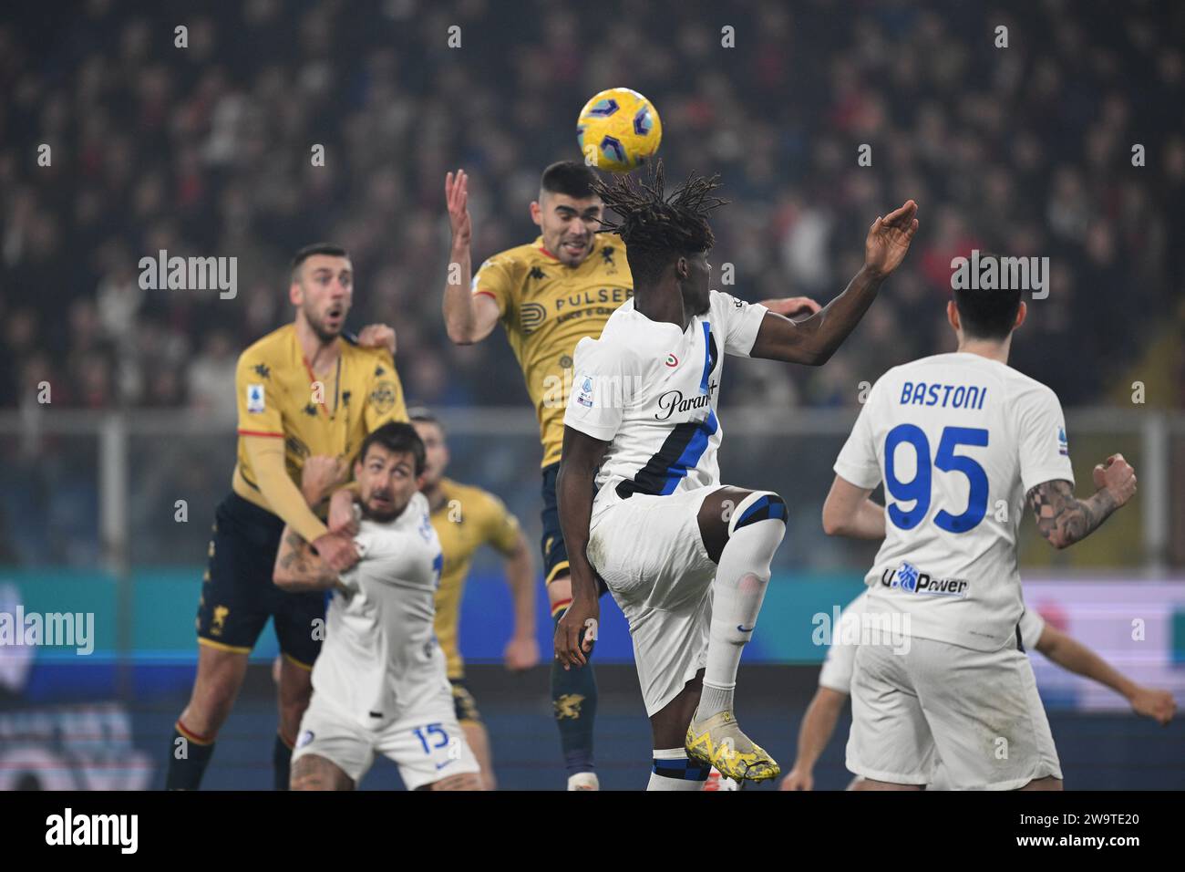Johan Vasquez (Genoa)Yann Aurel Bisseck (Inter) during the Italian ...