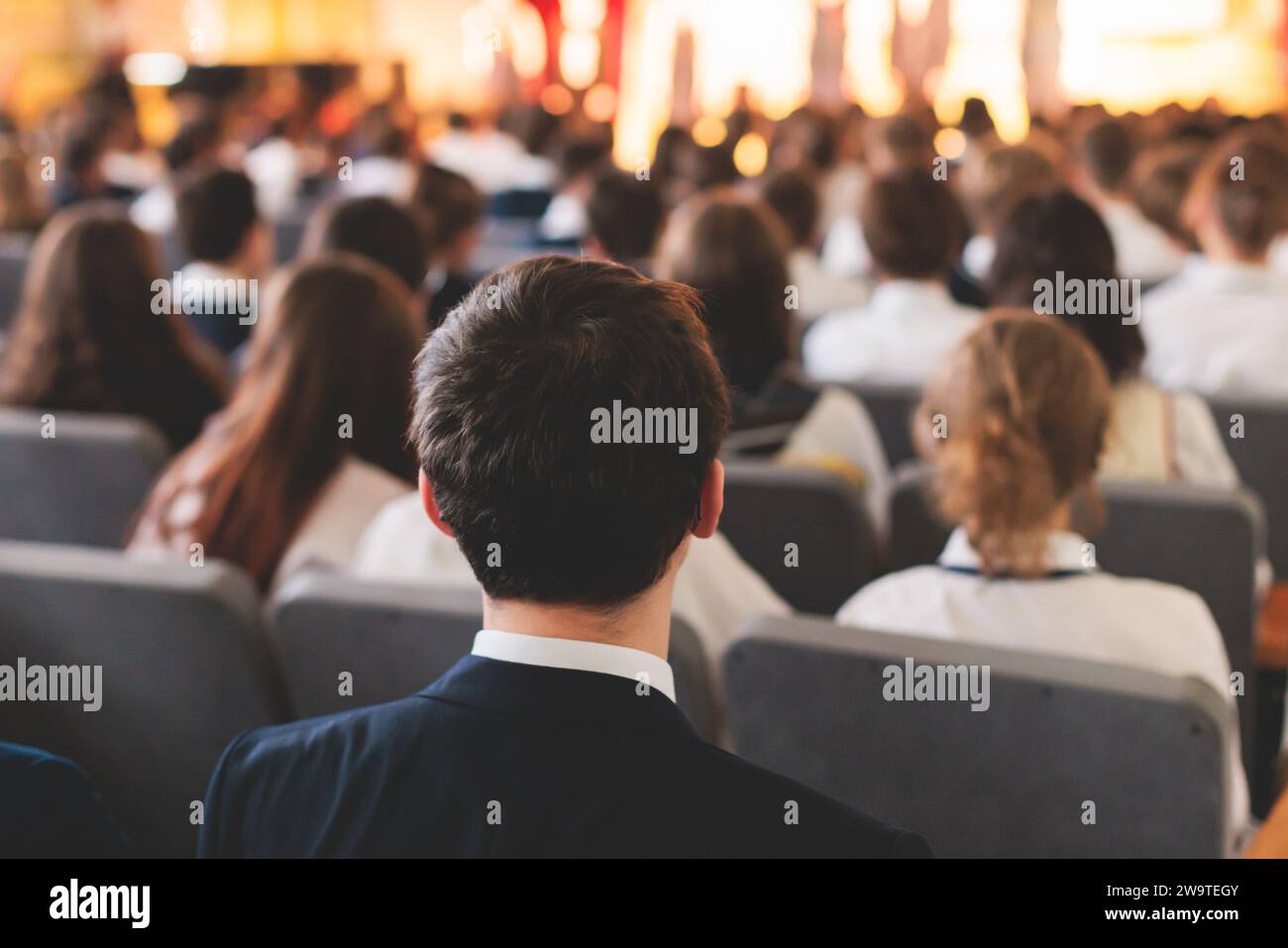 Boy in school hall auditorium hi-res stock photography and images - Alamy