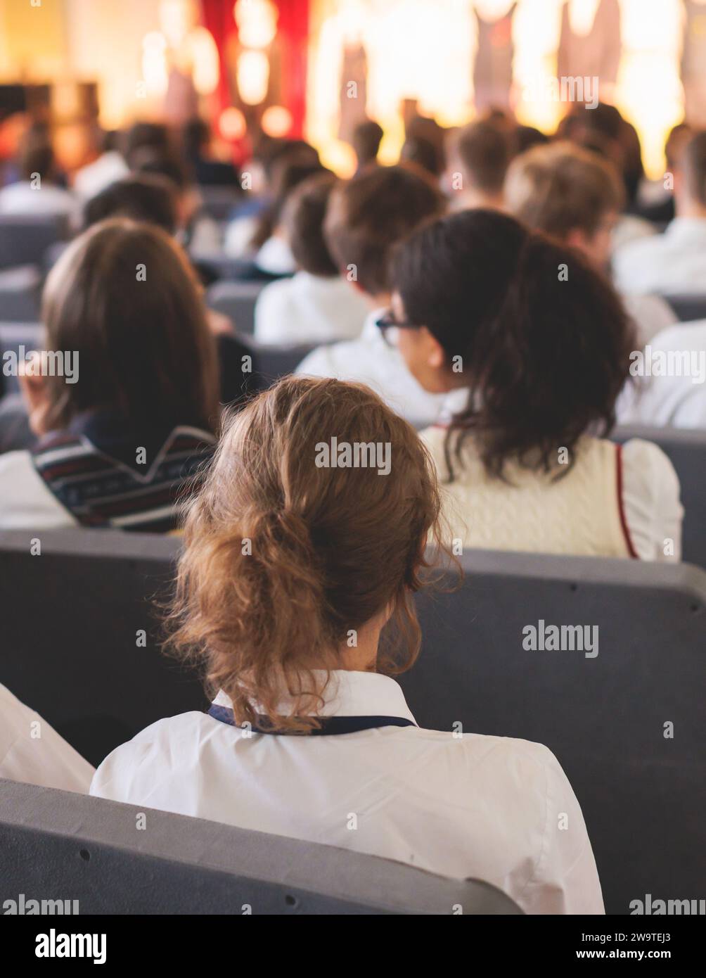 Boy in school hall auditorium hi-res stock photography and images - Alamy