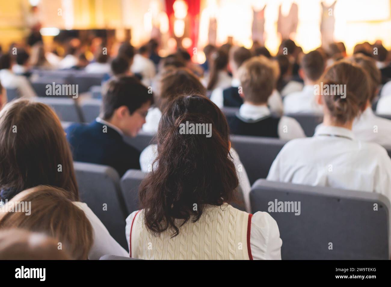 Boy in school hall auditorium hi-res stock photography and images - Alamy